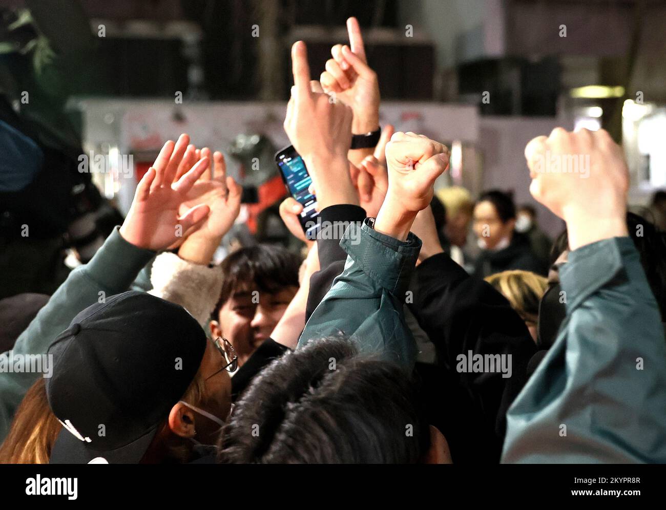 Tokyo, Japan. 2nd Dec, 2022. Japanese football fans celebrate Japan's ...