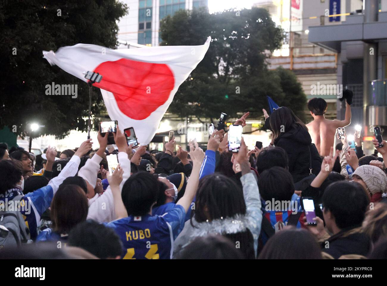 Tokyo, Japan. 2nd Dec, 2022. Japanese football fans celebrate Japan's ...