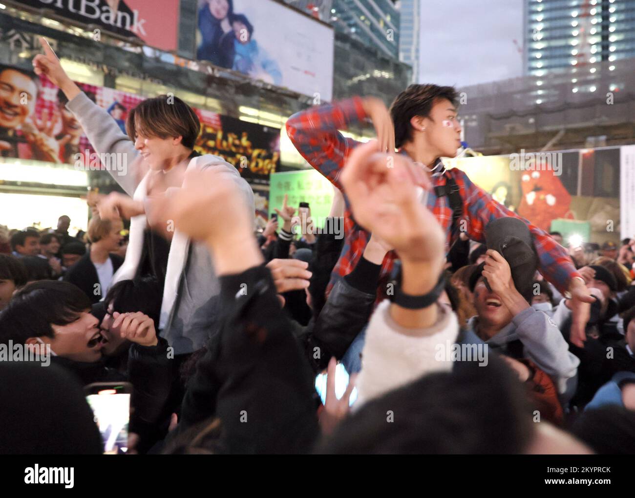 Tokyo, Japan. 2nd Dec, 2022. Japanese football fans celebrate Japan's ...