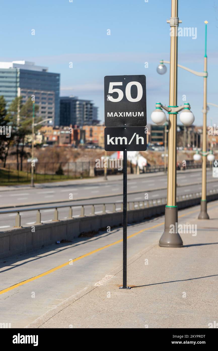 Speed limit road sign in the street, 50 km per hour maximum in Ottawa ... Speed limit road sign in the street, 50 km per hour maximum in Ottawa ...