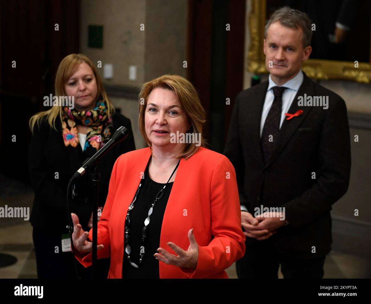 Bea Bruske, President of the Canadian Labour Congress, centre, speaks ...