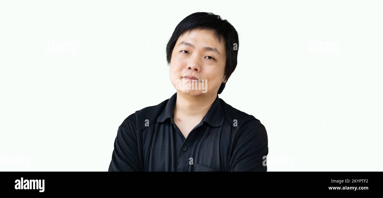 The portrait of Asian man in a black casual shirt with crossed arms ...