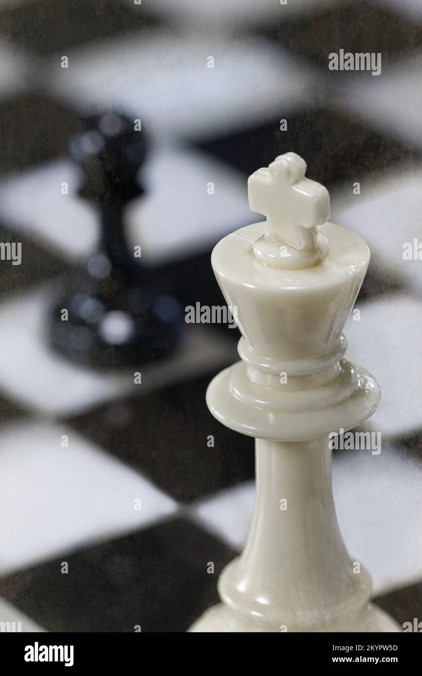 The Dominant Power? On a black and white chessboard, over the shoulder ...