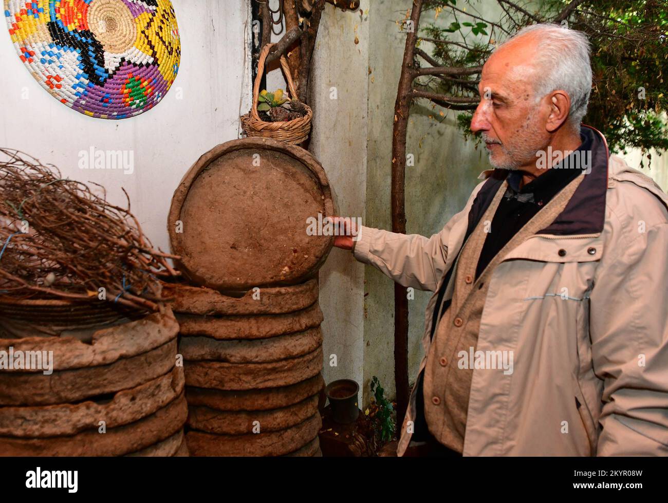 Hama, Syria. 17th Nov, 2022. Muhammad Saud, one of the very few silk ...