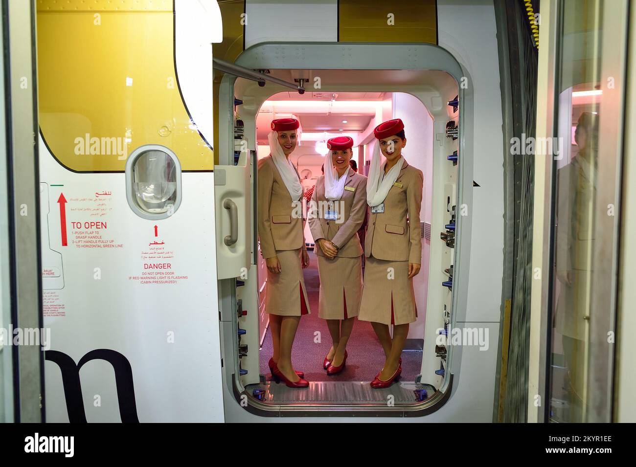DUBAI - NOVEMBER 22, 2015: Emirates crew members on board of Airbus ...