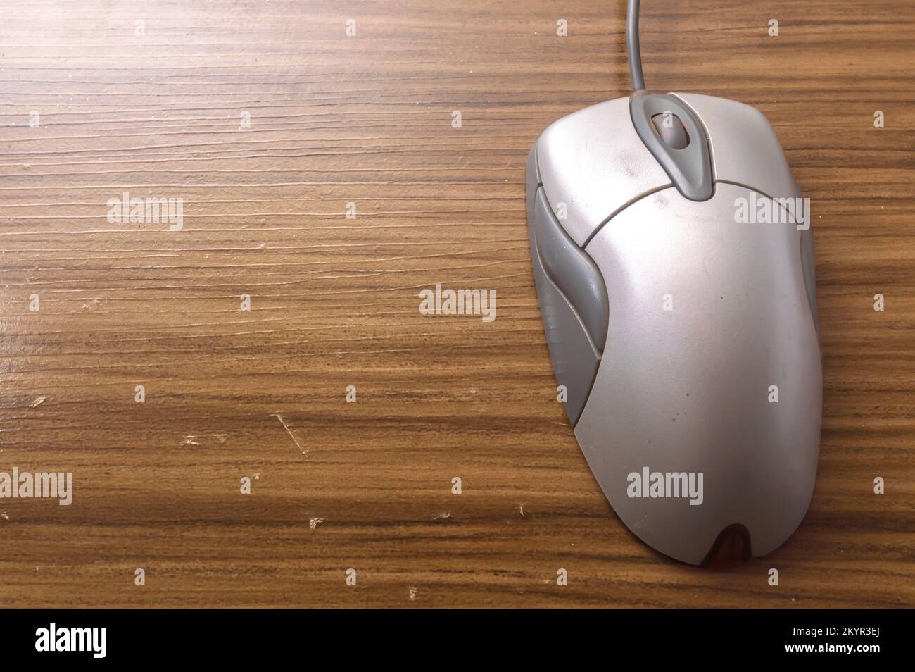 Modern computer mouse with wooden background and copy space Stock Photo ...