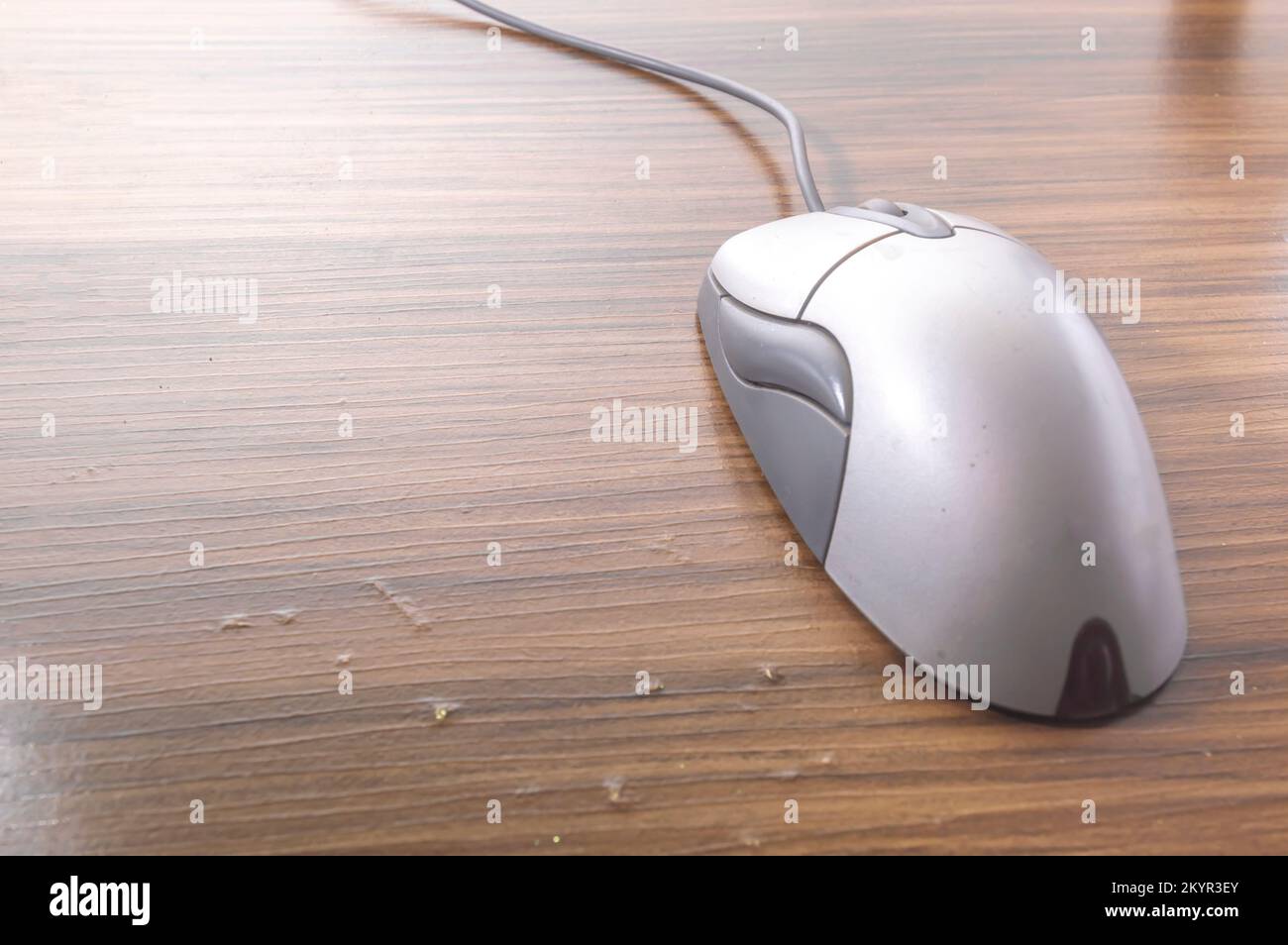 Modern computer mouse with wooden background and copy space Stock Photo ...