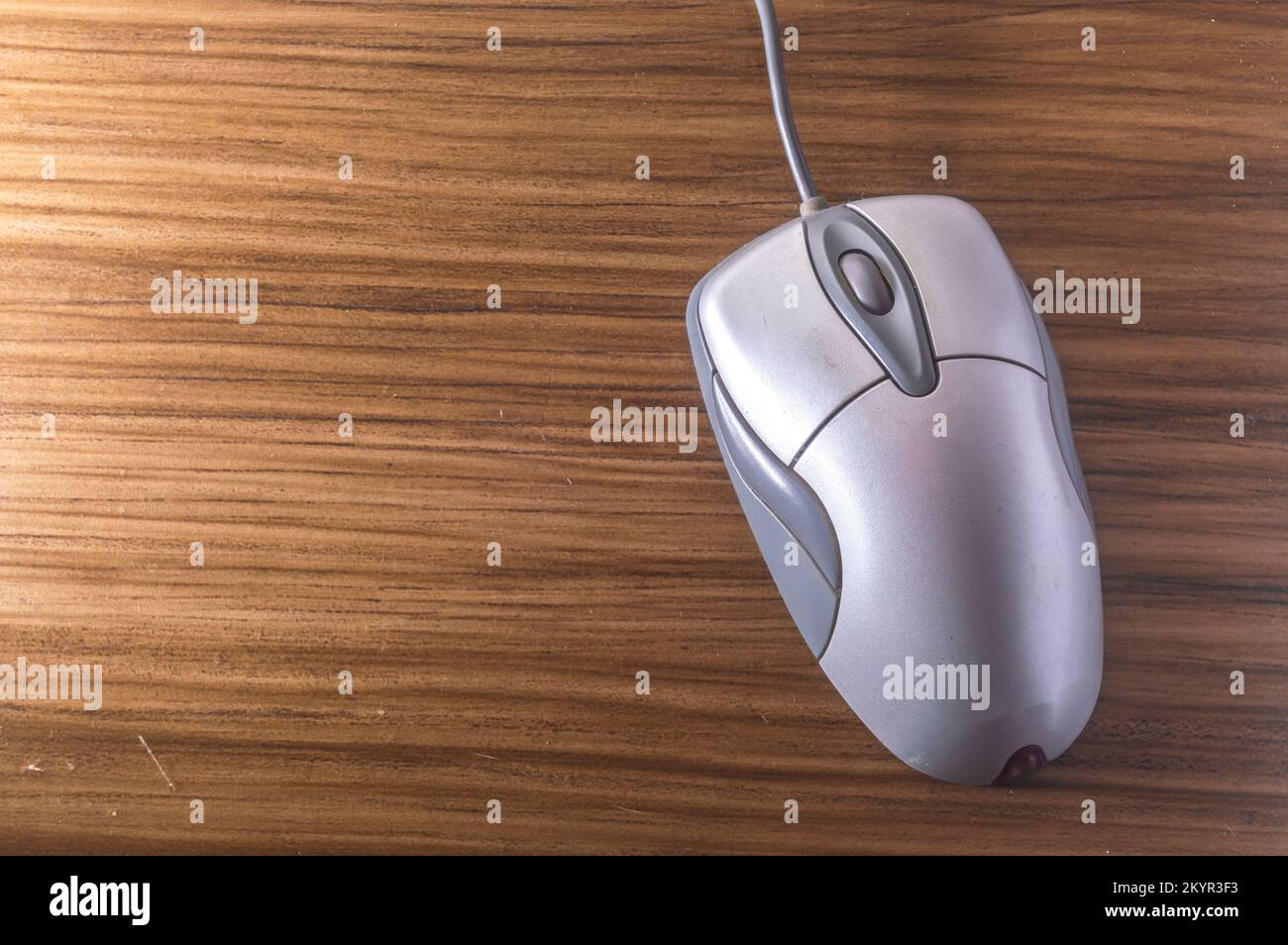 Modern computer mouse with wooden background and copy space Stock Photo ...