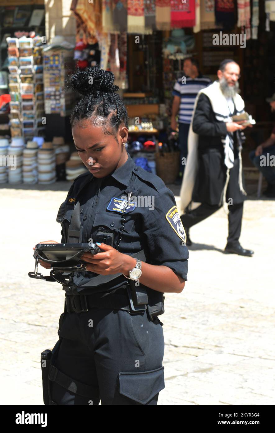 An Israeli policewoman at the Omar Ibn El-Khattab Sq. near Jaffa gate ...