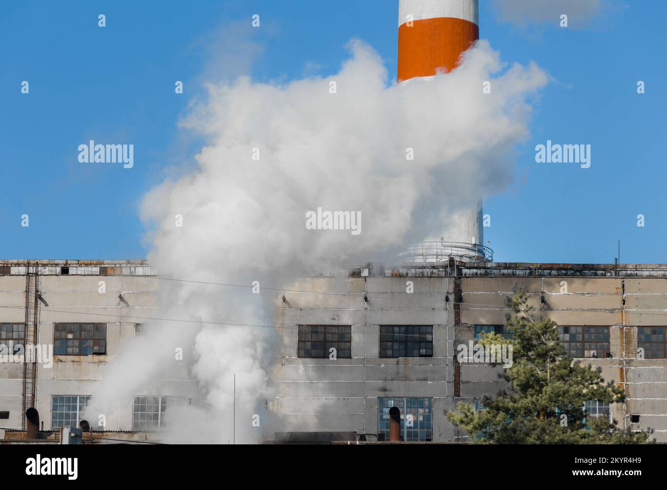 Emission of caustic toxic steam smoke at the plant industry and ...