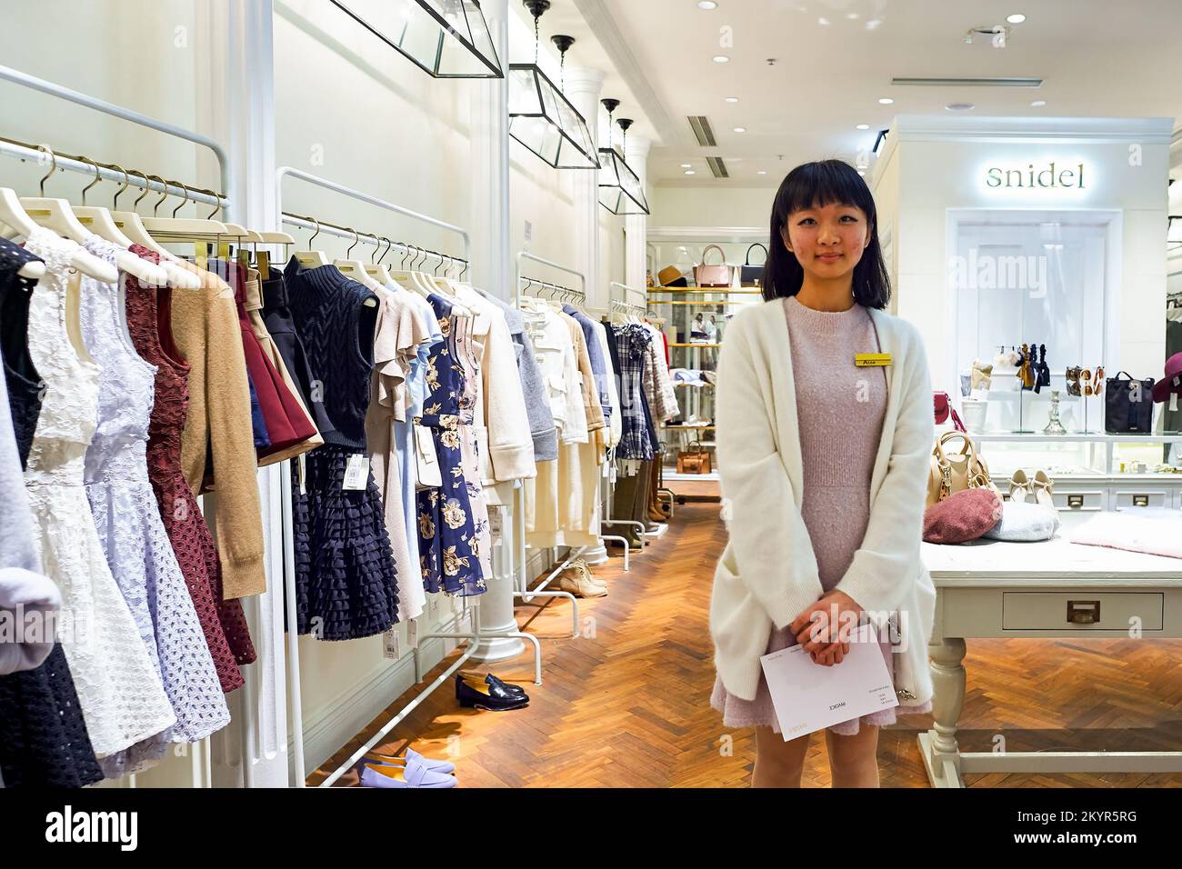 HONG KONG - NOVEMBER 02, 2015: seller in Snidel store in New Town Plaza ...