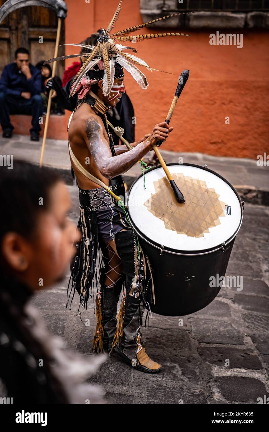 Indigenous man playing the drums at the Danza de Indios gathering of ...