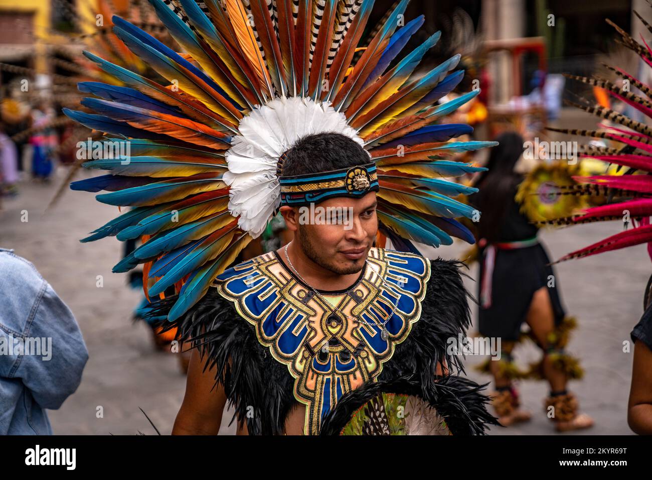 Indigenous man wearing a glamorous head dress at the Danza de Indios ...