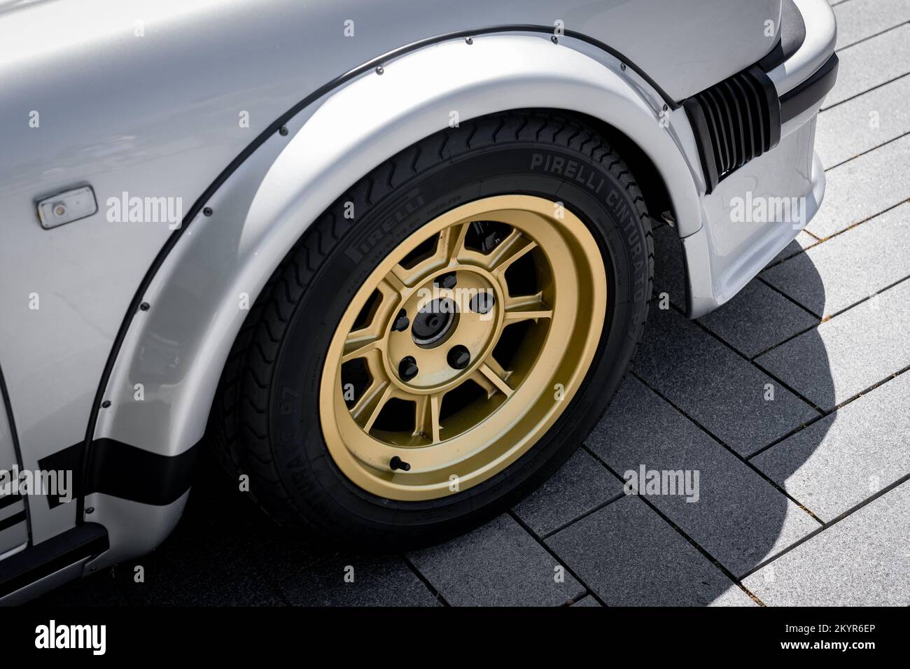 Close-up of 911 Turbo wheels at car exhibit outside of the Mercedes ...