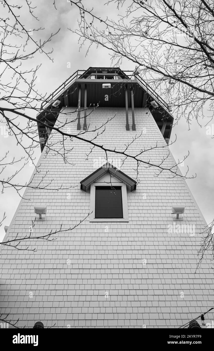 White lighthouse in cloudy overcast day. Tower of lighthouse. Nobody ...