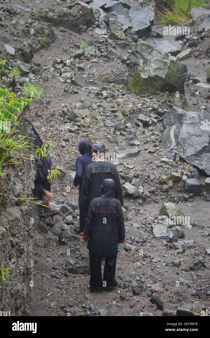 Larung sesaji (Javanese thanksgiving) Gunung Kelud. Larungan is one of ...