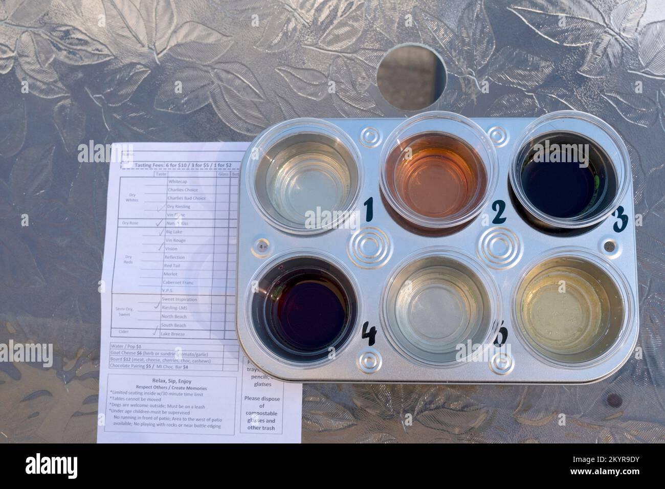 6 different samples of wine and a checklist at a local winery Stock ...