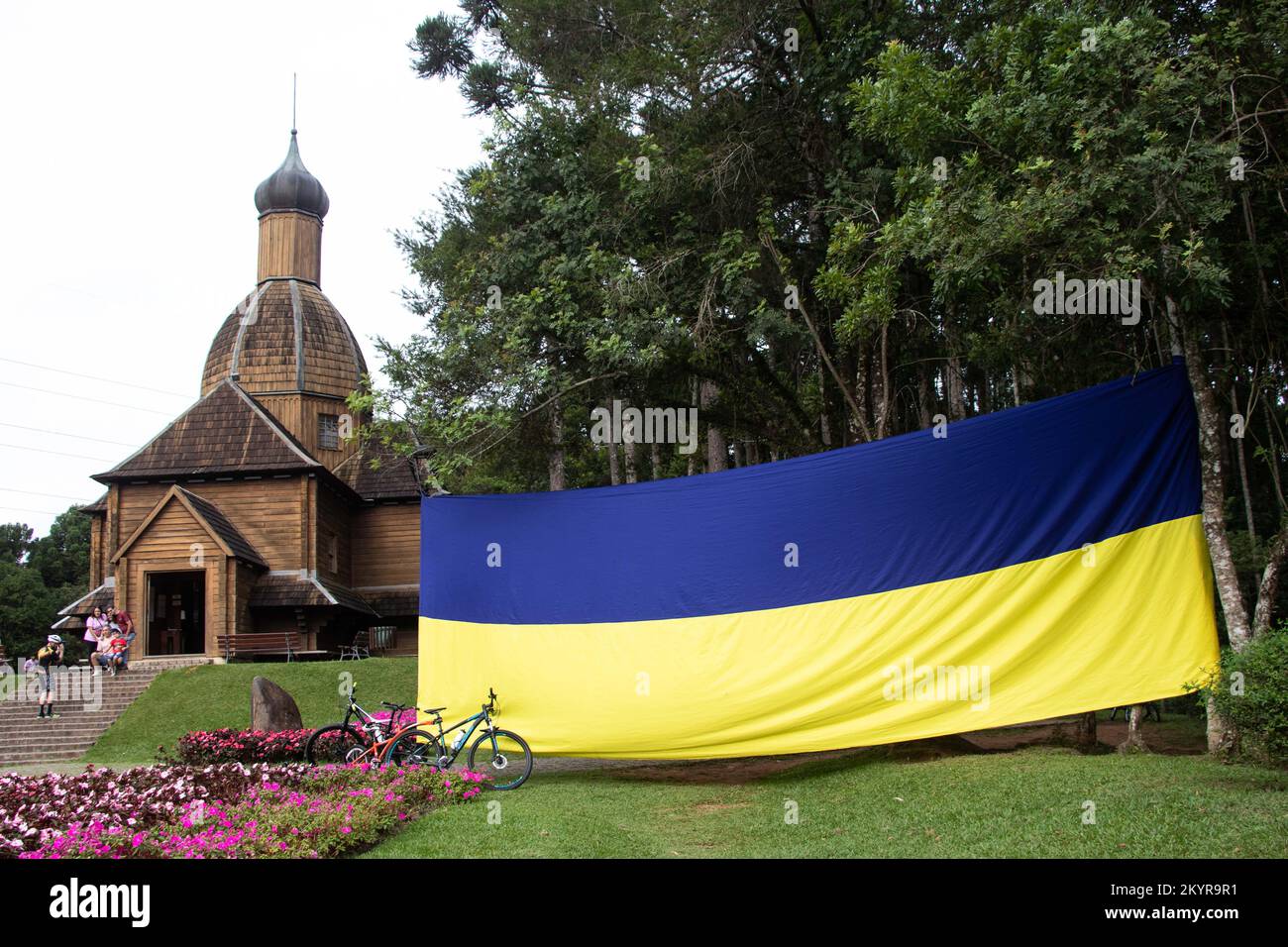 Flag of Ukraine in front of a replica of an Orthodox temple at the ...