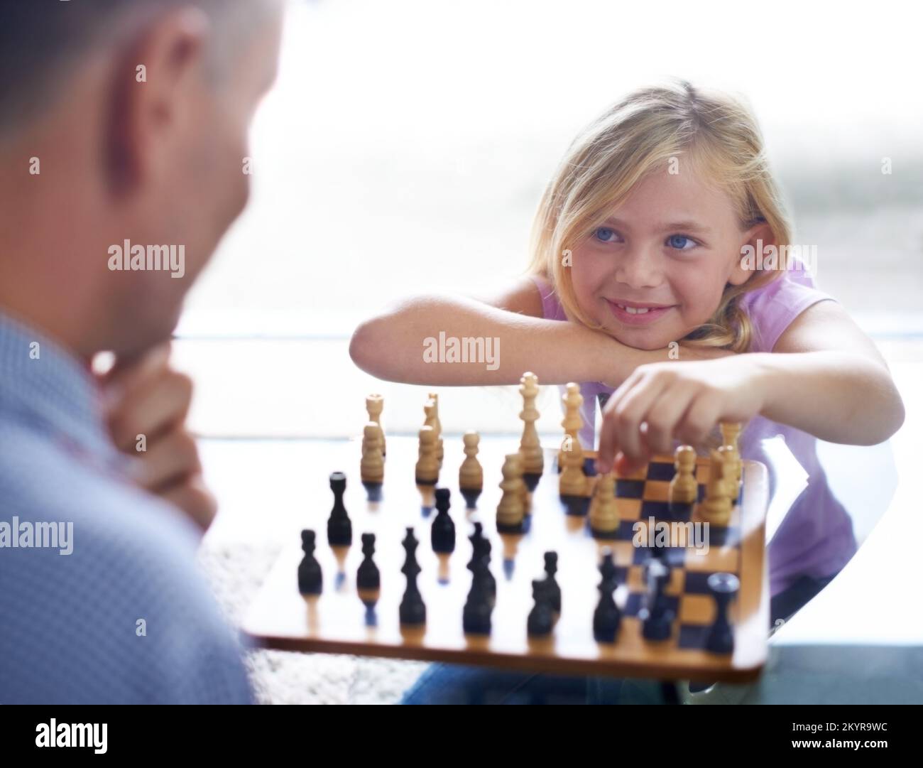 Kids chess with parents hi-res stock photography and images - Alamy