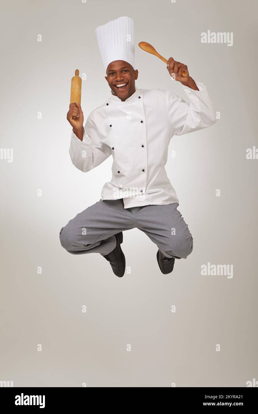 Chef jump food in kitchen hi-res stock photography and images - Alamy