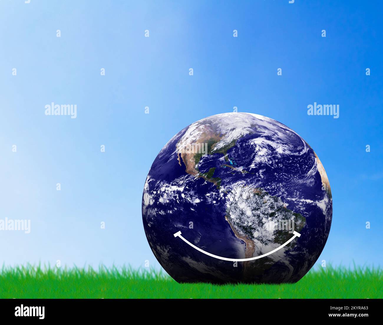 Happiness concept, the Earth smile on green grass background, nature ...
