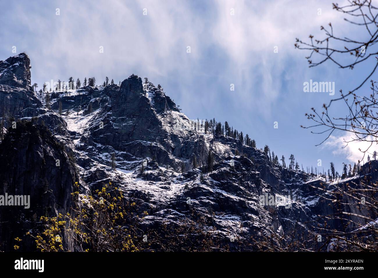 Landscape of granite rock cliffs with a cloudy sky in spring at ...