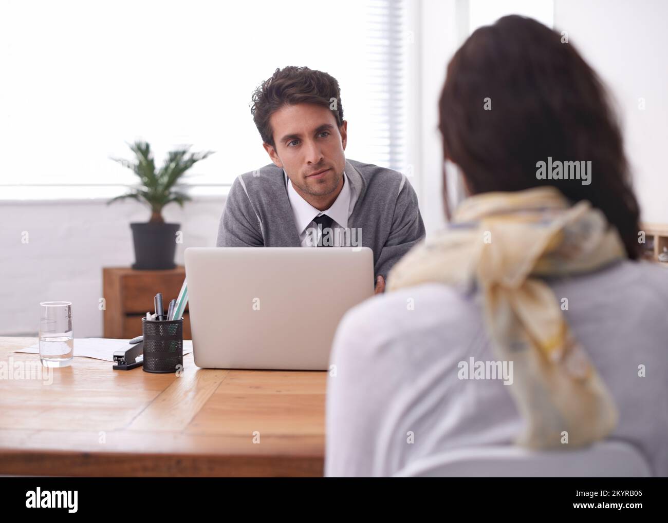 Man looking at person opposite him hi-res stock photography and images ...