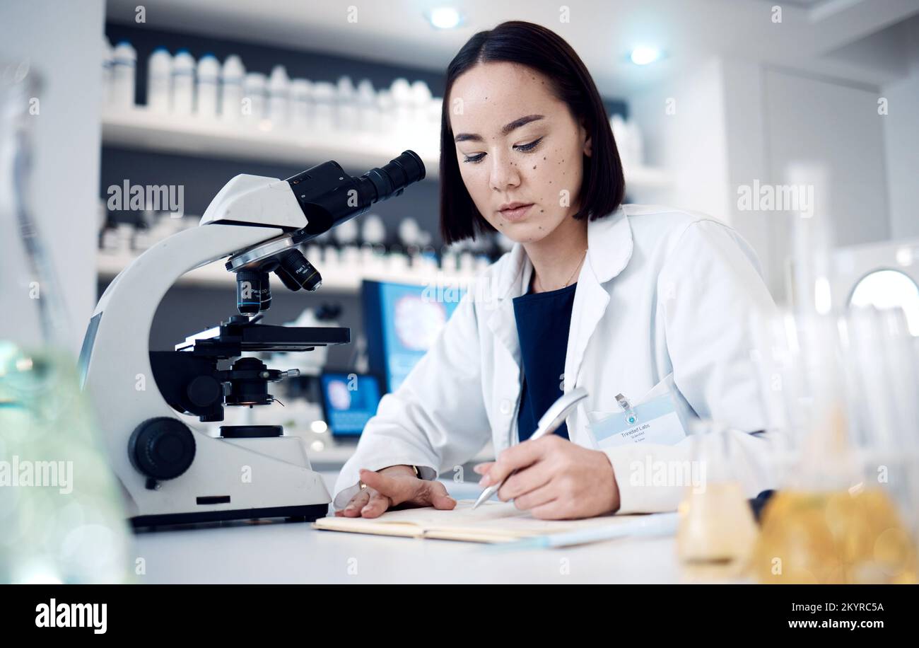 Science, chemistry research notebook and scientist writing chemical ...