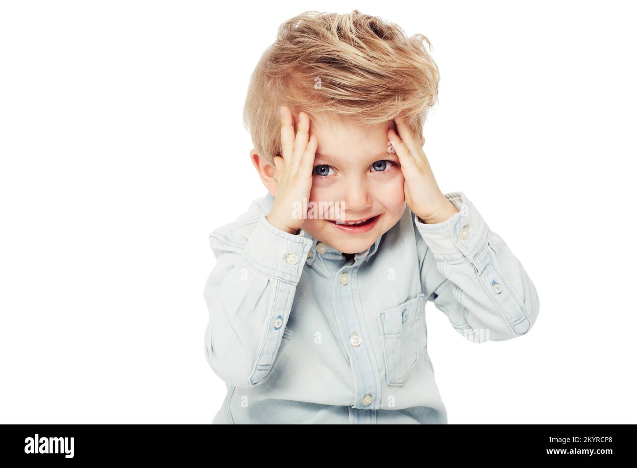 I see you...A cute little boy smiling as he peeks out from behind his ...