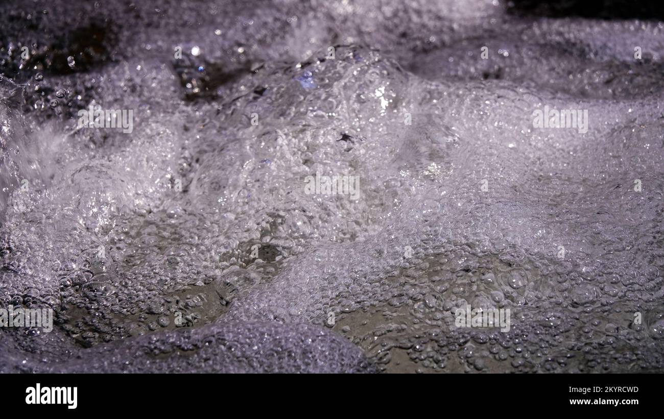 Water in the fountain flies, drips, foams, flows Stock Photo - Alamy