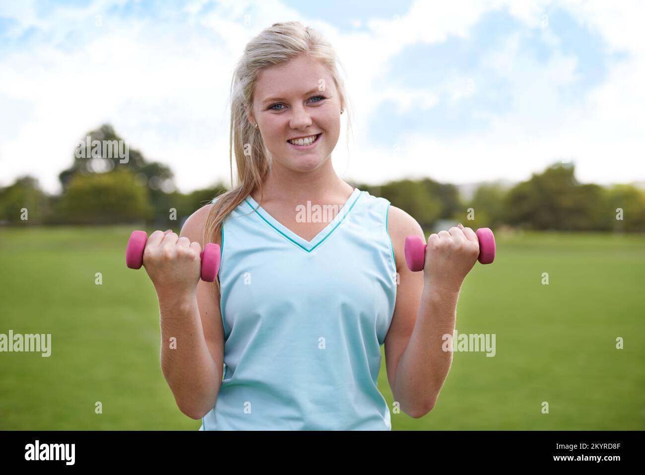 Sunshine and exercise. a group of young women exercising outdoors Stock ...