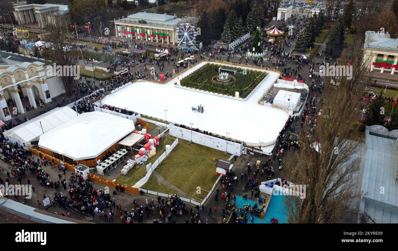 Aerial panoramic view cityscape urban park, outdoor ice skating rink ...