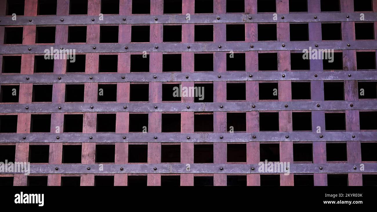 Background vintage wrought-iron barriers of entry into the city, they ...