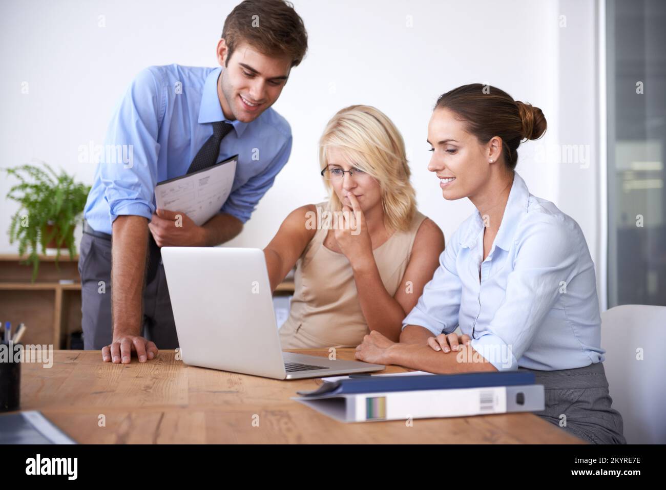 They are the future of this company. Three young professionals working ...