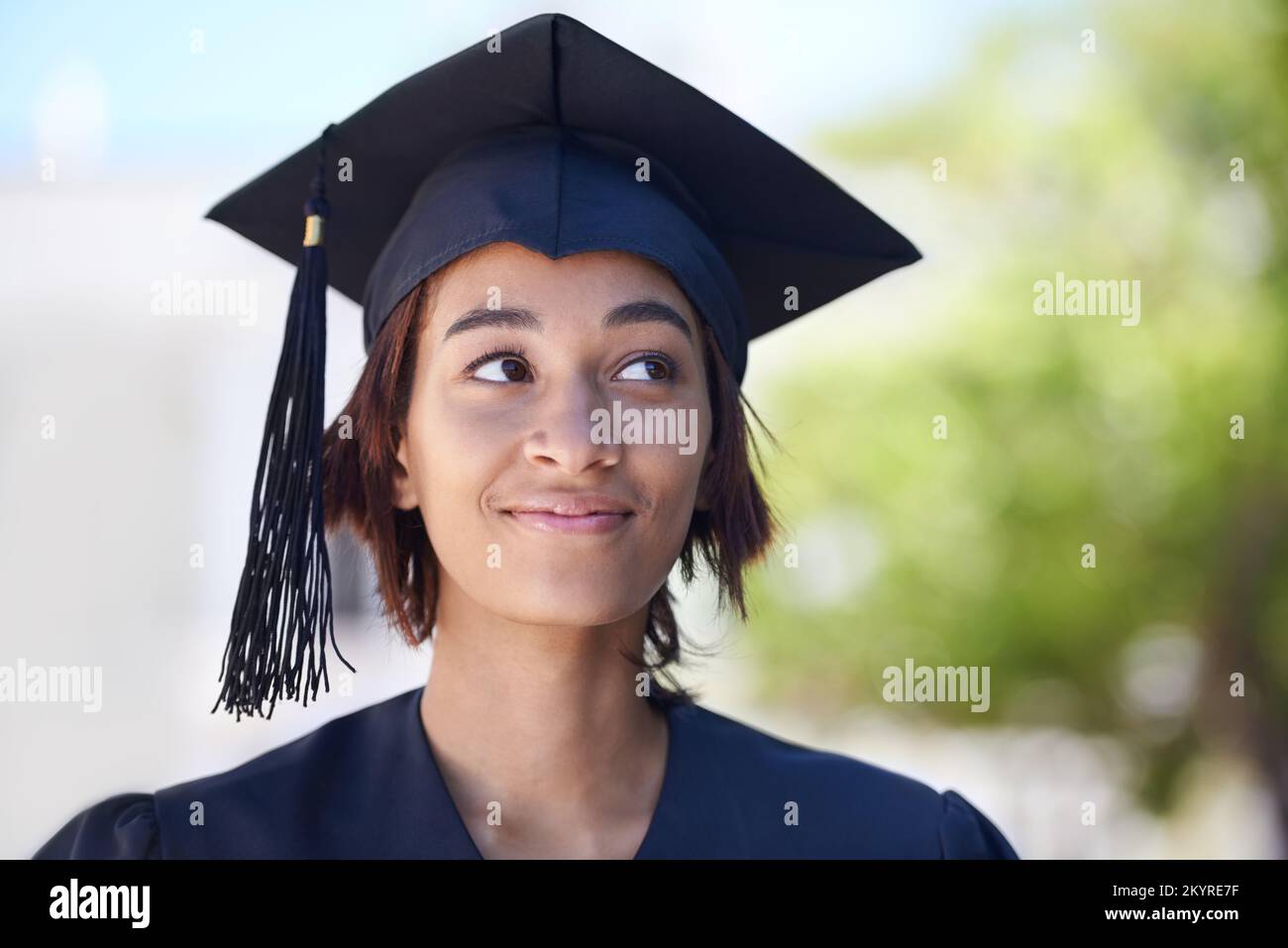 Thinking of what she can do with her degree. An ethnic graduate in ...
