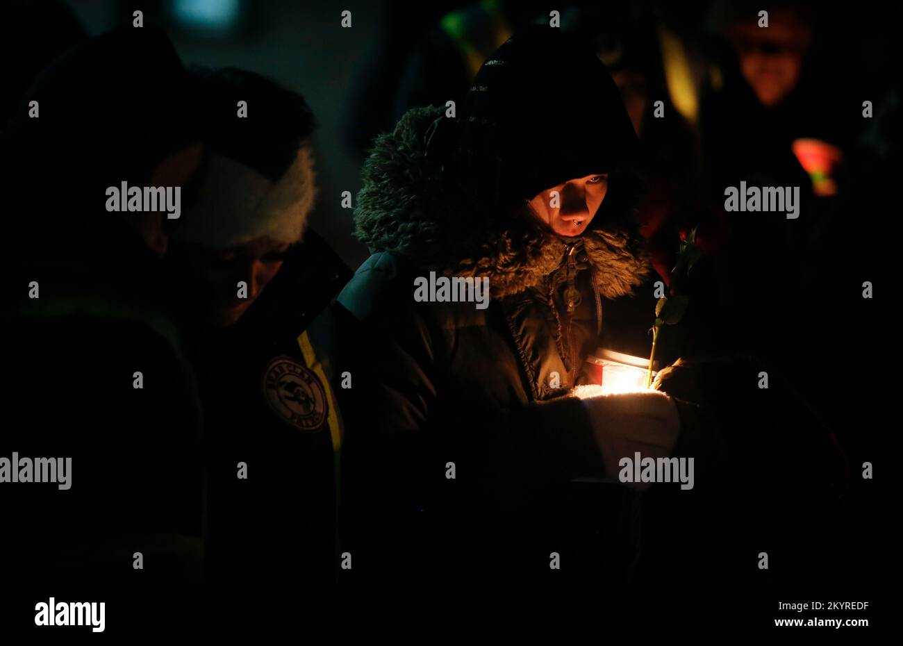 Family and friends of three murdered women gather at a vigil in ...