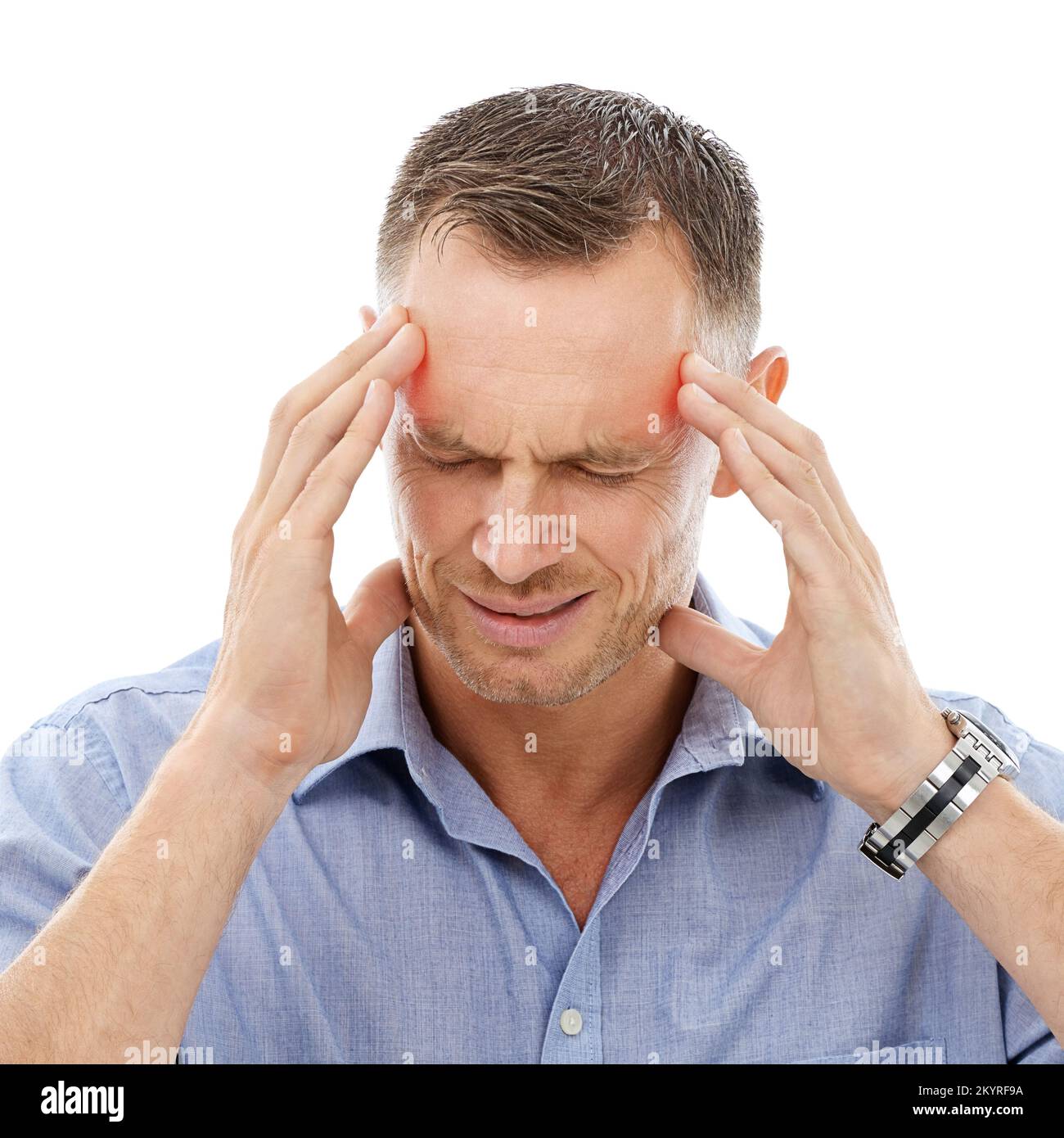 Tension headache. Studio shot of a mature man suffering from a head ache isolated on white Stock ...