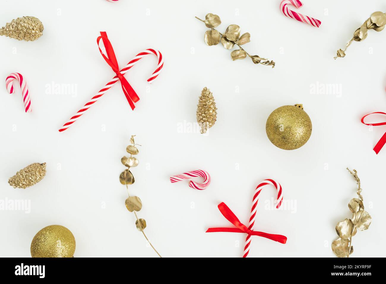 Christmas pattern with tree decoration and candy canes on white. Flat ...