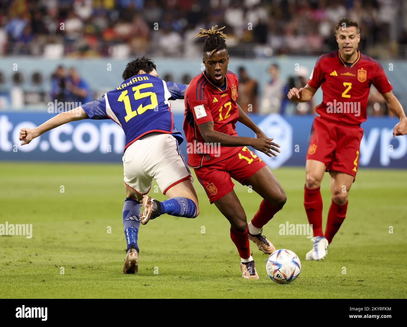 Ar-Rayyan, Qatar - 01/12/2022, Nico Williams of Spain, Daichi Kamada of Japan (left) during the ...