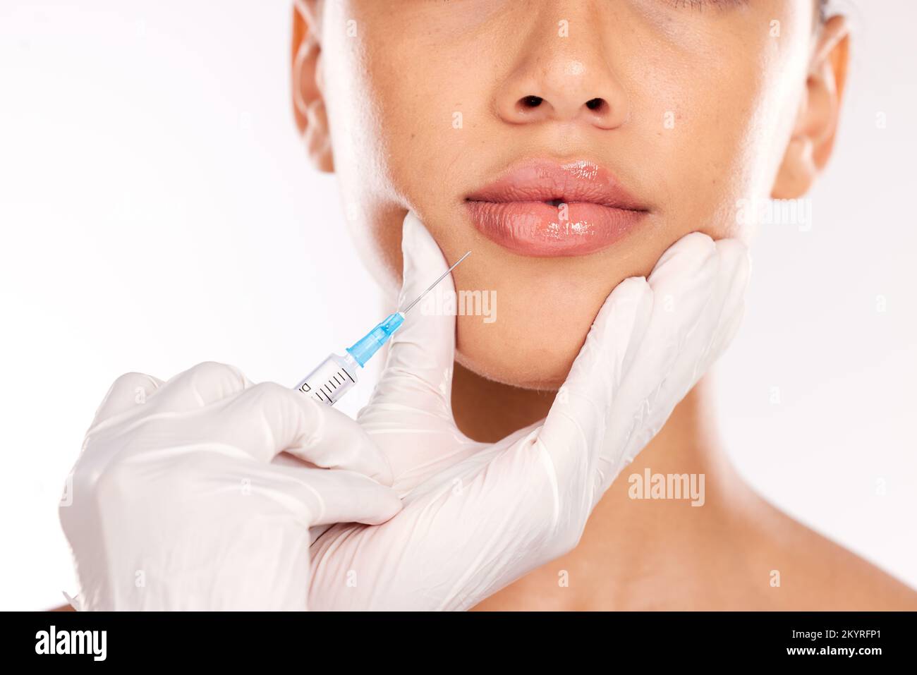 Doctor hand, botox and woman with collagen, needle and face in studio ...