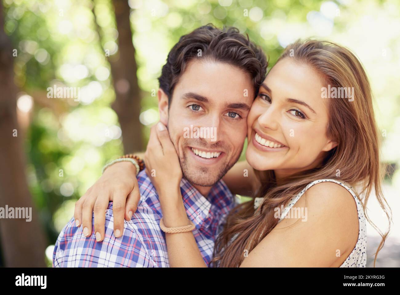 I cant keep my hands off him. Portrait of a smiling young couple ...