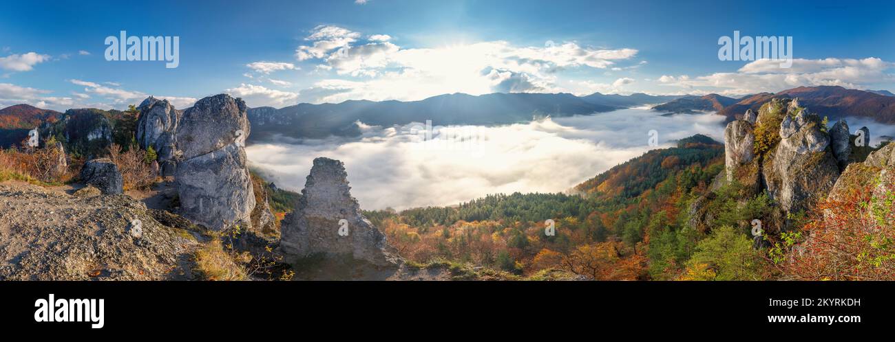 Panoramic view of mountain landscape with foggy valley during autumn ...