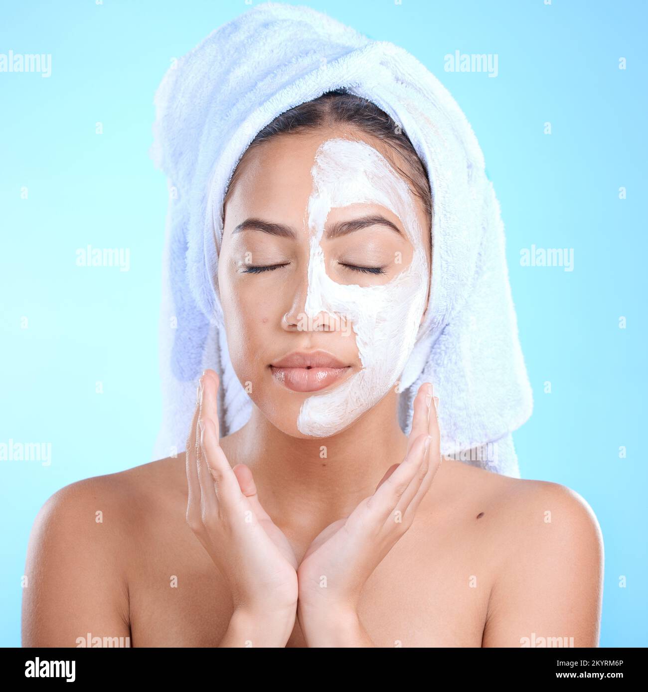 Beauty, face mask and skincare of a woman on blue studio background for ...
