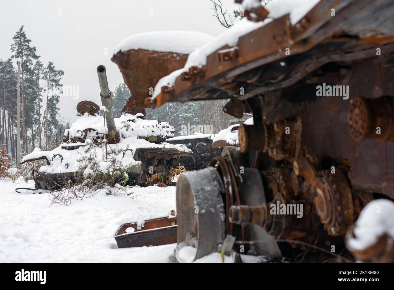 Russian battle tank in the snow which was destroyed on the roadside of ...