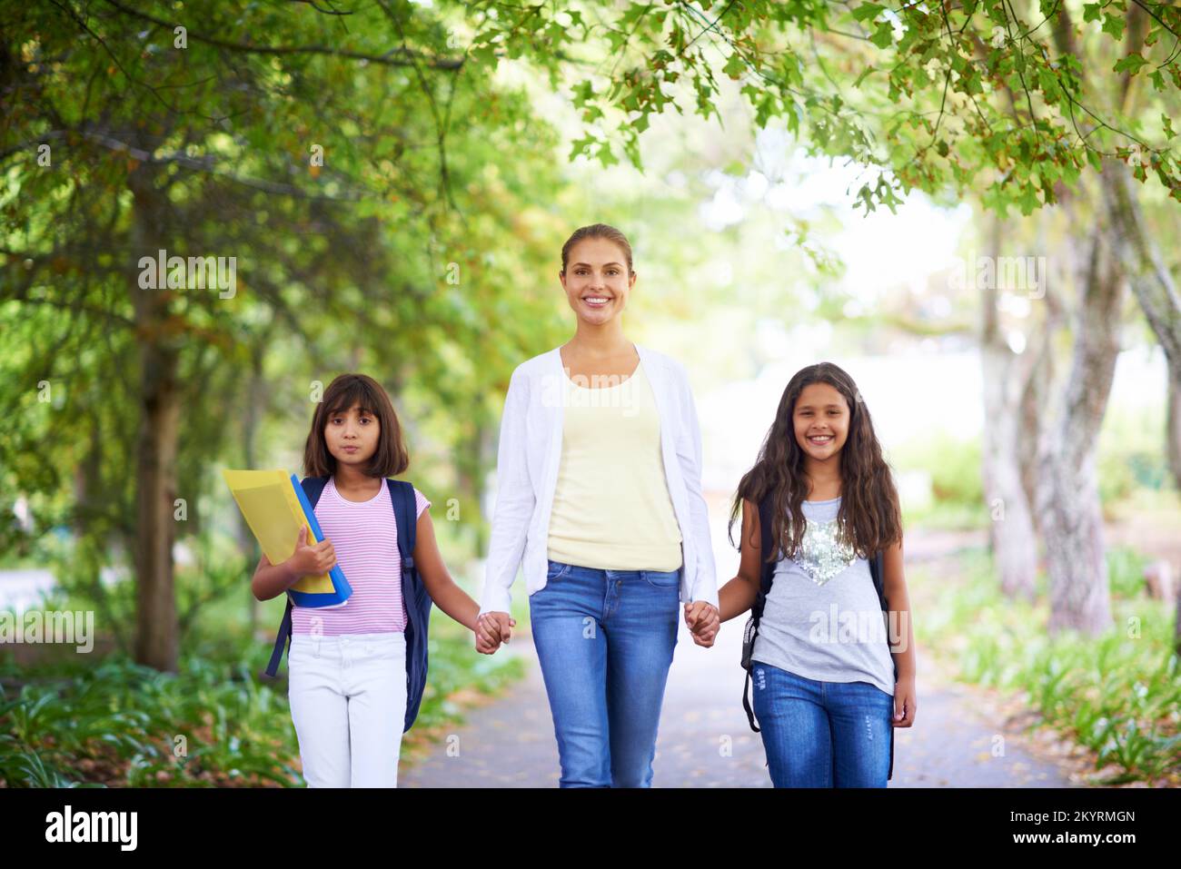 Group children school walking back hi-res stock photography and images ...