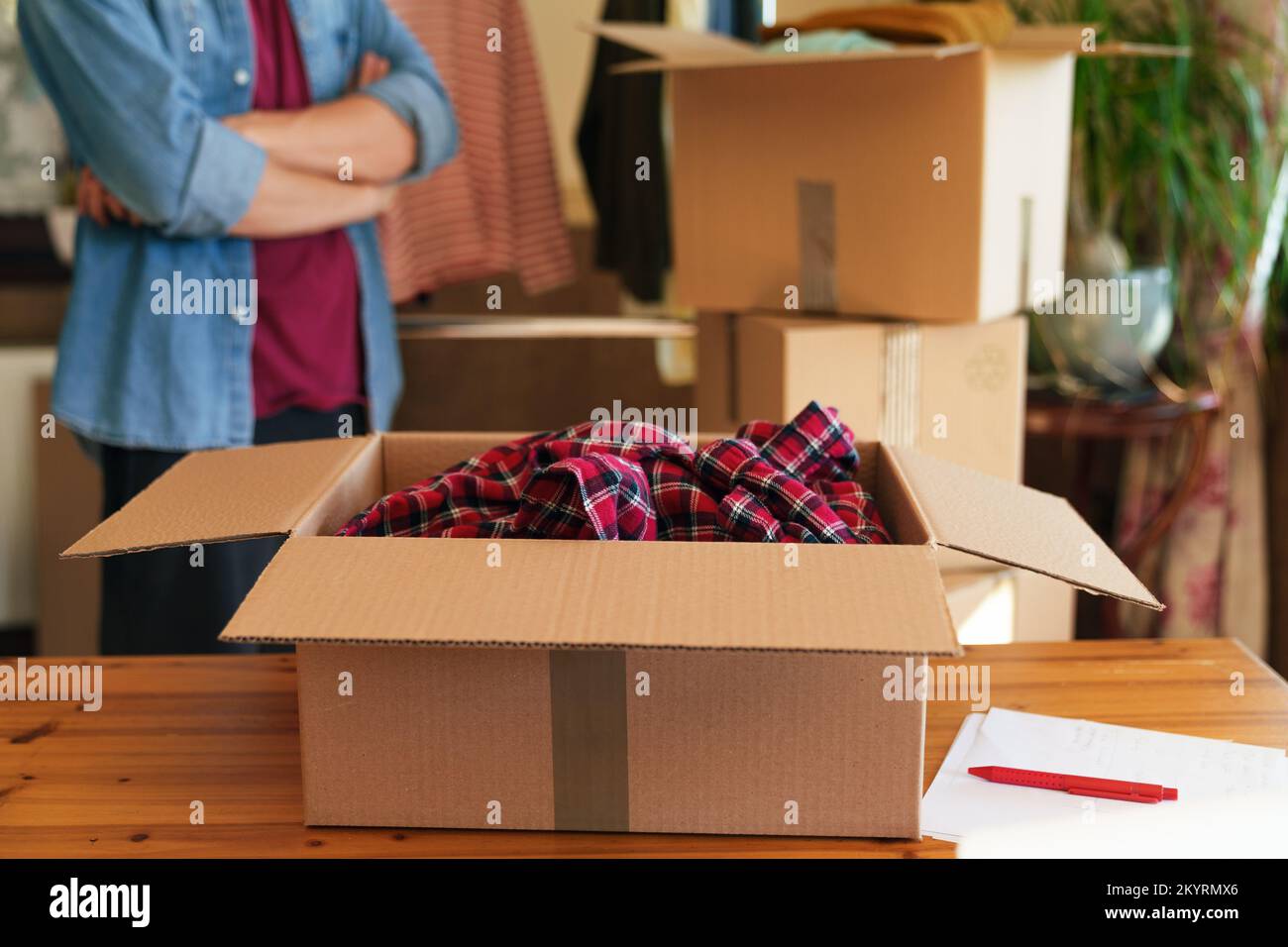 Pre owned clothes resale or donation Stock Photo - Alamy