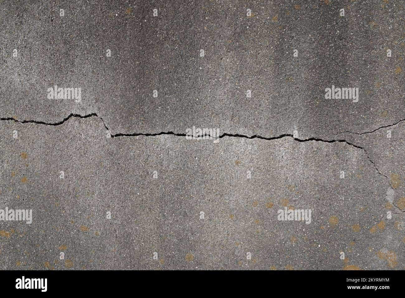 Background image, close-up, structure of a grey concrete wall with ...