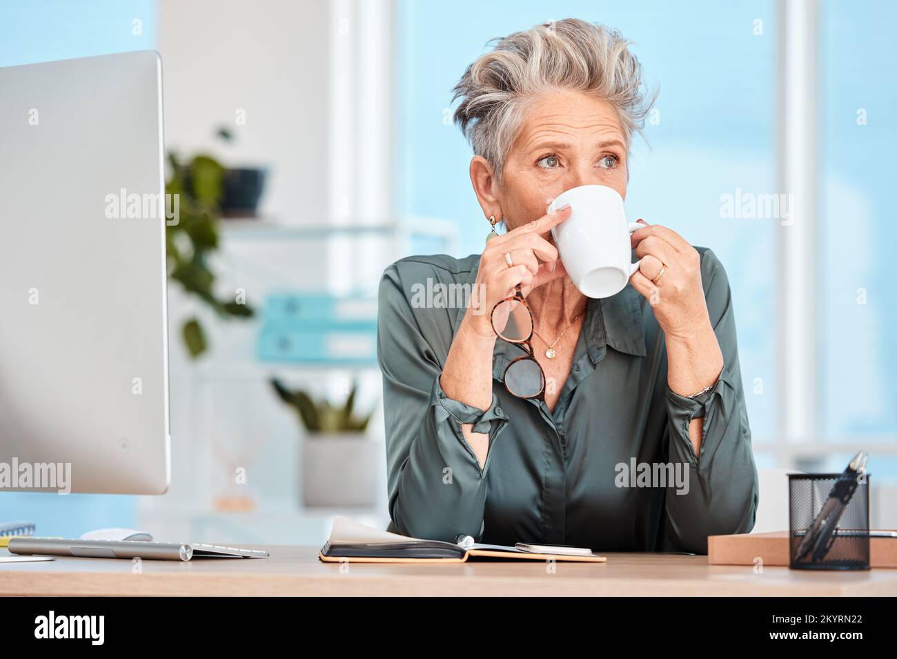 Ceo, vision and coffee with a businesswoman enjoying a cup of tea while ...