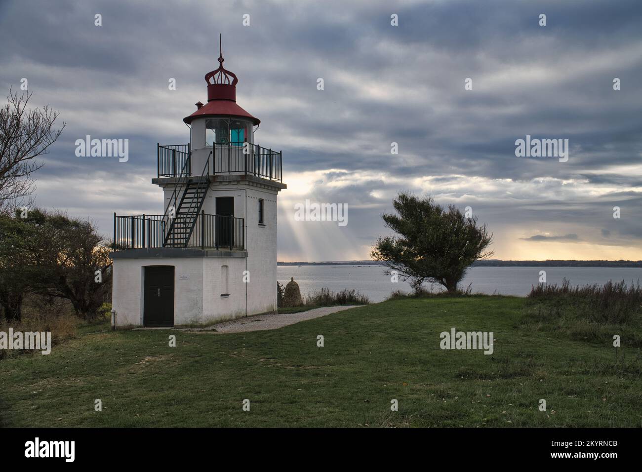 Lighthouse, Spodsbjerg Fyr in Huntsted on the coast of Denmark. Sun ...
