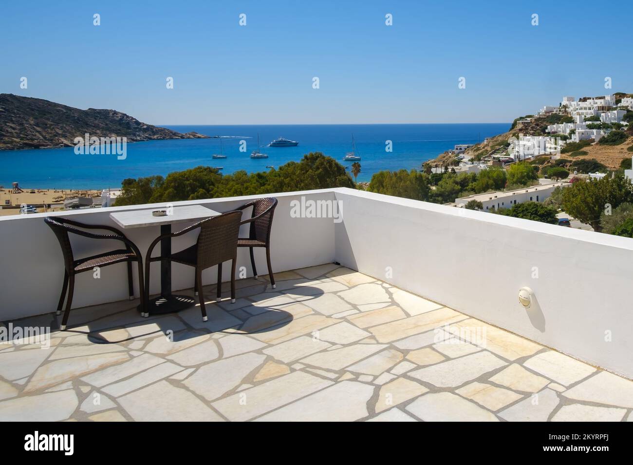 Amazing view from a balcony with chairs and a table overlooking the ...